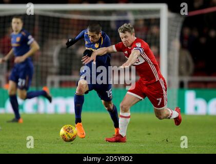 Hull City's Evandro Goebel and Middlesbrough's Grant Leadbitter battle ...