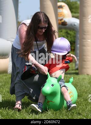 Racegoers during Kids Carnival Day at warwick Races Stock Photo - Alamy