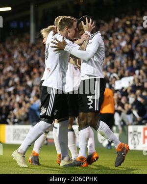 Fulham's Ryan Sessegnon (right) celebrates scoring his side's first ...