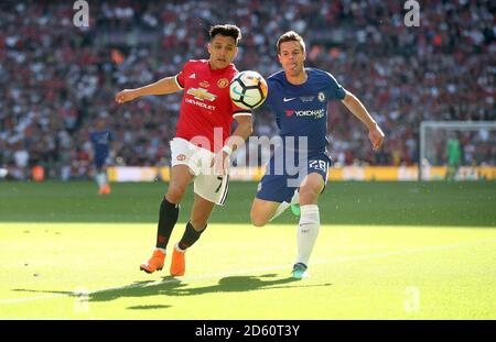 Manchester United's Alexis Sanchez (left) and Chelsea's Marcos Alonso ...