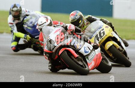 Britain's Jeremy McWilliams leads the 500cc race from eventual winner ...
