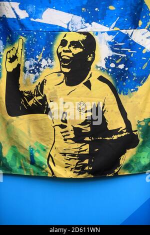 A Brazil flag hangs in the stands with the names of former Brazil ...