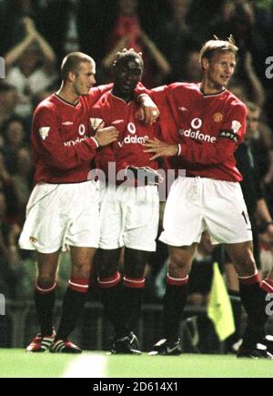 Manchester United's David Beckham is congratulated by Nicky Butt after ...