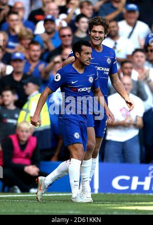 Chelsea's Pedro (left) celebrates scoring his side's first goal of the ...