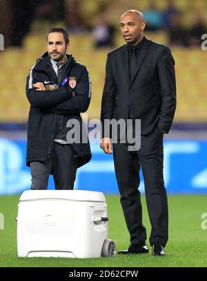 AS Monaco's Manager Thierry Henry (right) inspects the pitch before the ...