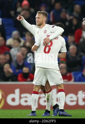 Denmark's Thomas Delaney, left, celebrates after scoring his side's ...