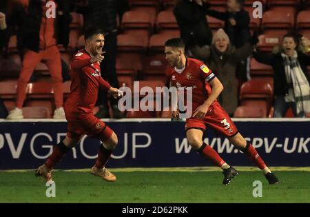 Walsall's Luke Leahy (right) celebrates scoring his side's first goal ...