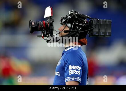 A person wears a camera set-up around their head on the pitch before ...