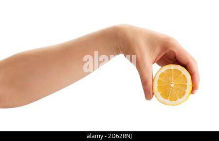 Hand squeezing half of lemon isolated on white background. Clipping ...