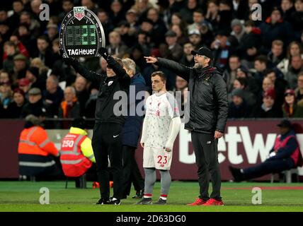 Liverpool's manager Jurgen Klopp stands on the pitch during warmup ...