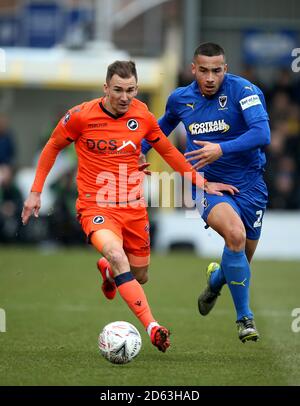 Millwall's Jed Wallace (left) and AFC Wimbledon's Rod McDonald (right ...