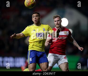 Bristol City's Tomas Kalas, left, challenges for the ball with ...