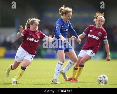 Chelsea Women's Erin Cuthbert (centre) on the ground after picking up ...