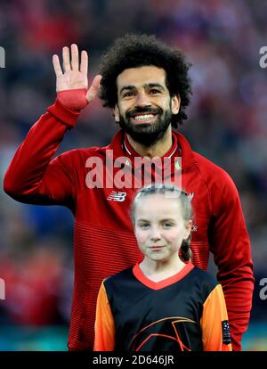 Liverpool's Mohamed Salah waves his fans at the end of the English ...