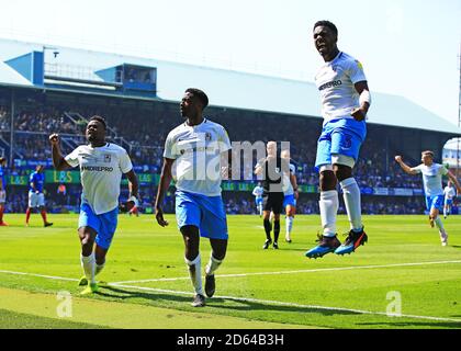 Coventry's Jordy Hiwula (centre) celebrates scoring his sides first ...