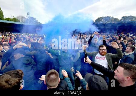 Bury fans celebrate as Bury are promoted to league one Stock Photo - Alamy
