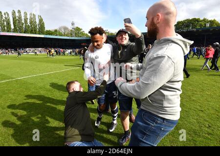 BuryÂ’'s Nicky Maynard celebrates with Bury fans as they are promoted ...