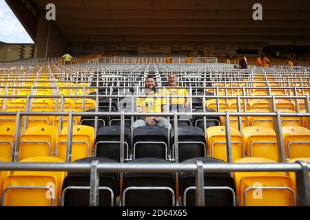 Wolves fans sit in the new safe standing area of Wolverhampton ...
