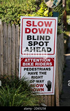 Slow Down Bike sign on pavement, Brisbane Powerhouse, New Farm ...