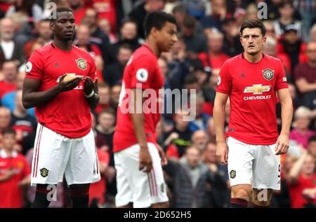 Manchester United's Harry Maguire (right) appeals to referee Andrew ...