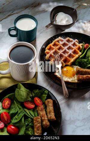 Belgian waffle breakfast served with sausage eggs and coffee Stock ...