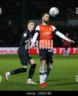 Luton Town's Alfie Doughty (right) and Portsmouth's Matt Ritchie battle ...