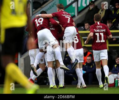 Northampton Town's Nicky Adams (hidden) celebrates scoring his side's ...