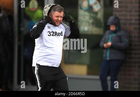 Derby County fans brave the wintry conditions Stock Photo - Alamy