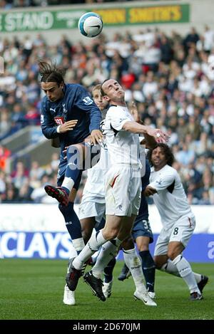 Tottenham Hotspur's Dimitar Berbatov (left) and AC Milan's Andrea Pirlo battle for the ball ...