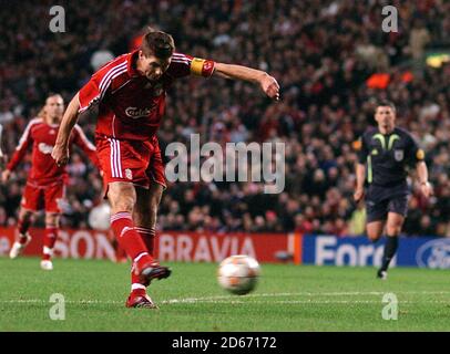 Liverpool's Steven Gerrard scores his side's third goal of the game ...