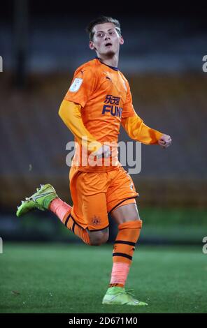Newcastle United U21's Kyle Scott runs away from the shirt pull from ...