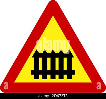 Warning sign with level crossing symbol Stock Photo - Alamy