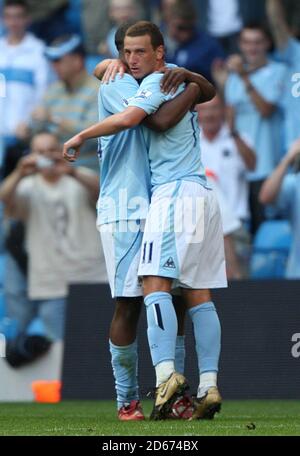 Manchester City's Blumer Elano celebrates after scoring the opening ...