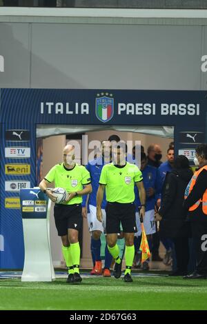 BERGAMO, ITALY - OCTOBER 14: Referee Anthony Taylor, Assistant Referee ...