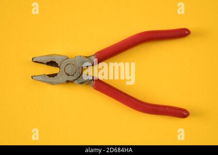 Yellow handled Pliers on isolated white background Stock Photo - Alamy