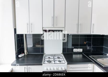 Kharkov, Ukraine - December 25, 2017. Simple modern interior of kitchen ...