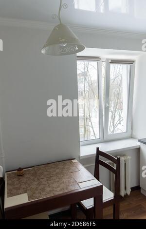 Kharkov, Ukraine - December 25, 2017. Simple modern interior of kitchen ...