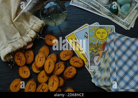 homemade wooden runes from the Tarot card on the table large Stock ...