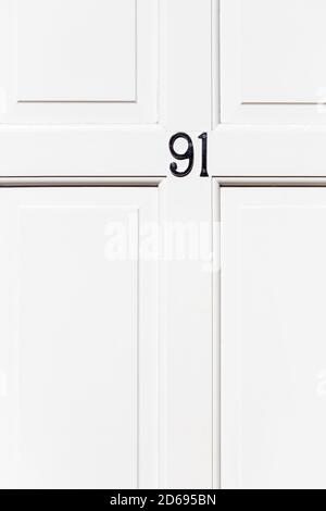 House number 91 sign on wall Stock Photo - Alamy