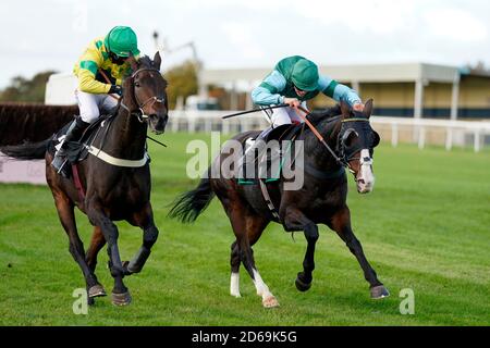 Follow The Swallow ridden by Lilly Pinchin (right) clears the last to ...