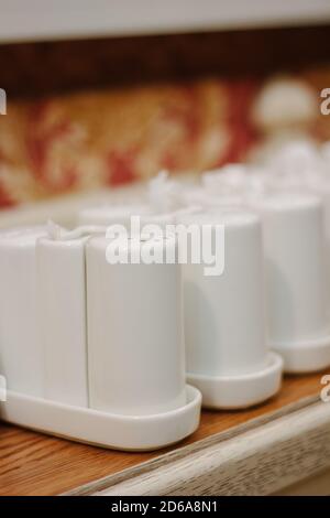 Row of salt shakers at restaurant during dinner Stock Photo - Alamy