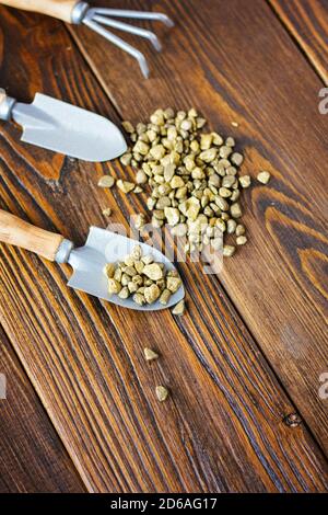 Gold mining concept - golden sand with instruments for mining Stock ...