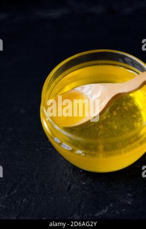 Indian ghee in a transparent glass bowl Stock Photo - Alamy