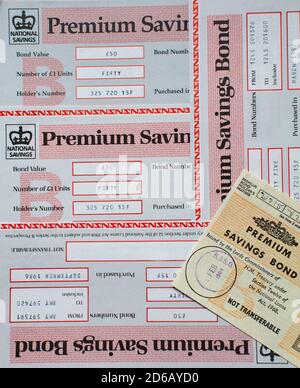A close up of vintage £1 and £2 Premium Savings Bonds from the United ...