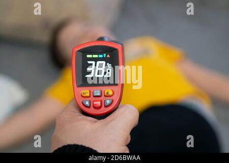 Measuring temperature with a digital thermometer in water Stock Photo ...