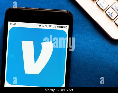 In this photo illustration the Venmo logo seen in the background of a ...