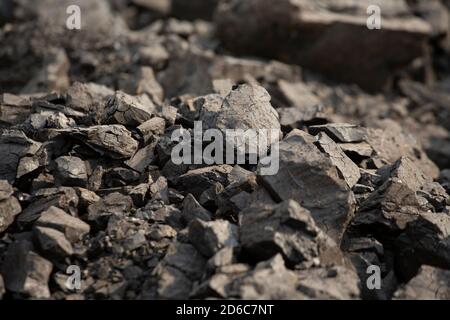 Texture of black raw coal in the mine, big and small, random size Stock ...