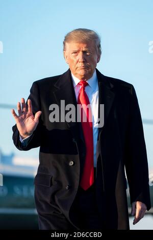 President Donald Trump prepares to board the newly designated Air Force ...