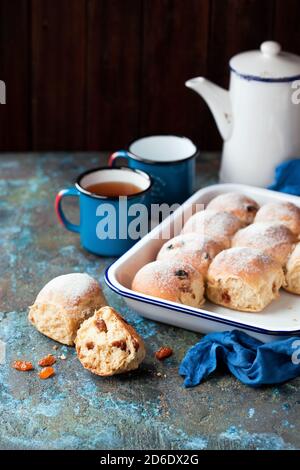 Tea mug and sweet homemade buns for morning breakfast Stock Photo - Alamy
