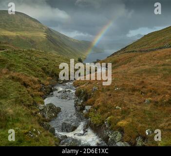 Vivid rainbow over waterfalls and Talla Reservoir in Autumn, Scottish ...